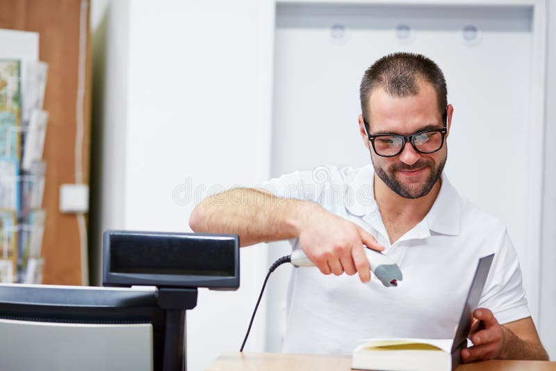 Cashier at Cash Register in Bookstore Stock Photo - Image of shop ...