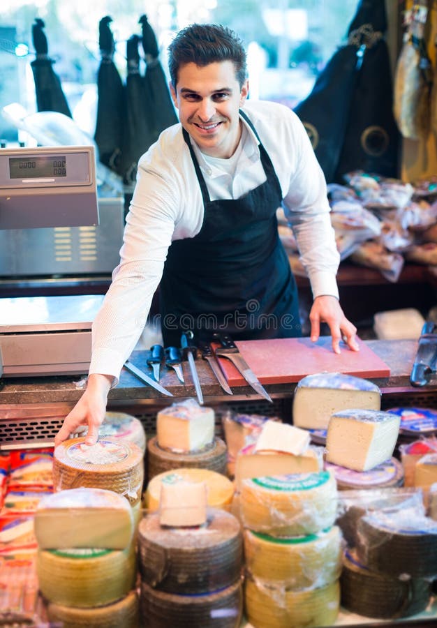 Salesman with Cheese in Gastronomy Stock Photo - Image of lamb ...