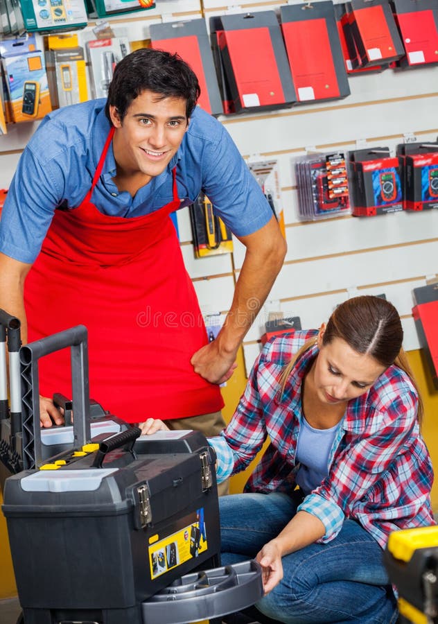 Salesman with Customer Examining Tool Case in Stock Image - Image of ...