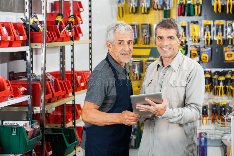 Salesman and Customer Using Tablet Computer Stock Image - Image of ...
