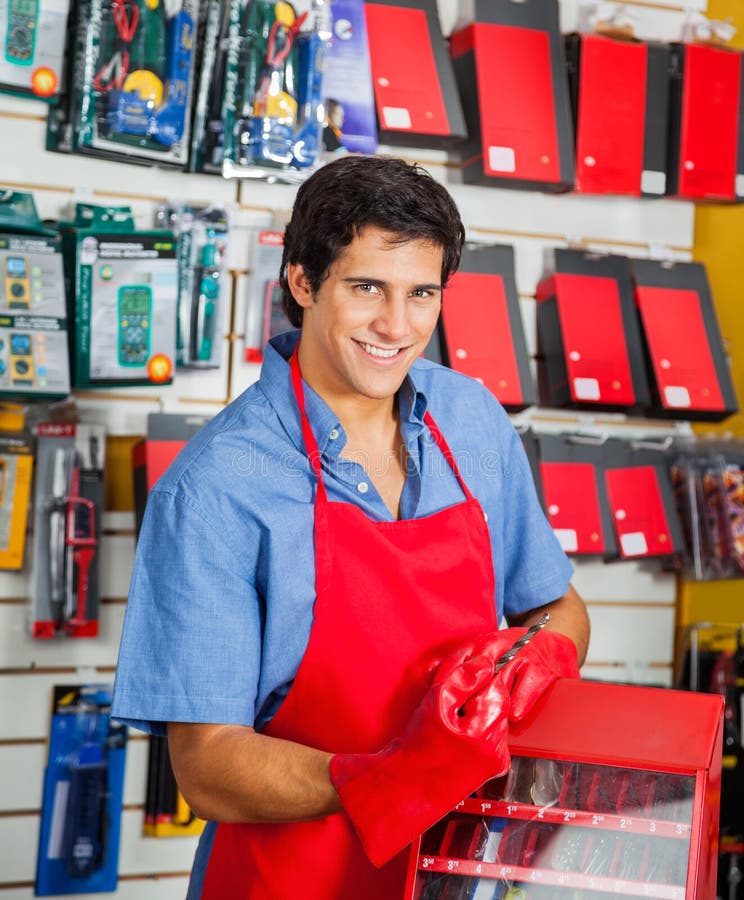 Salesman with Drill Bit and Toolbox in Shop Stock Image - Image of ...