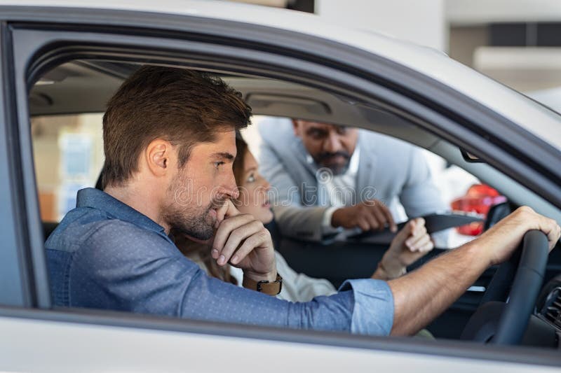 Car Salesman Explaining Car Features To Customer Stock Photos - Free ... Car Salesman Explaining Car Features To Customer Stock Photos - Free ...