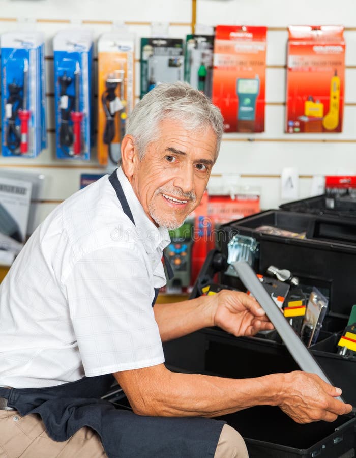 Salesman with Tool Box in Store Stock Photo - Image of salesperson ...