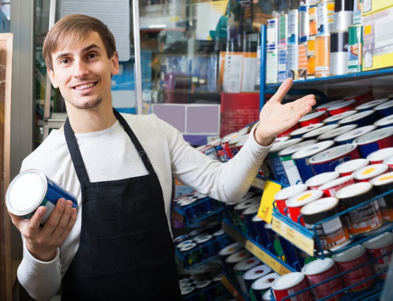 Salesman Offering Enamel in Store Stock Image - Image of building ...