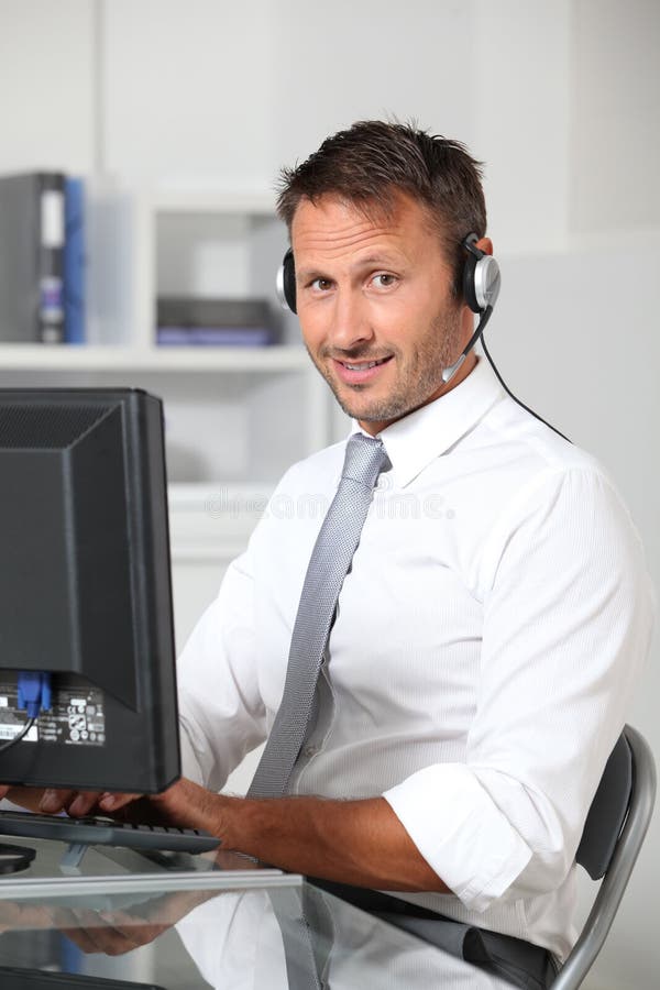 Salesman in the office stock image. Image of closeup - 16340211