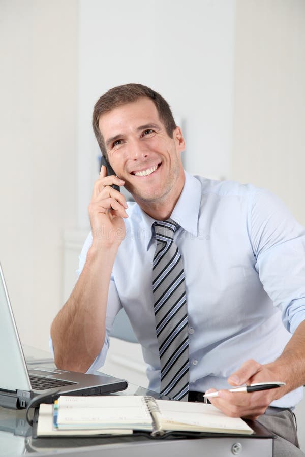 Salesman on the phone stock image. Image of adult, estate - 16577853