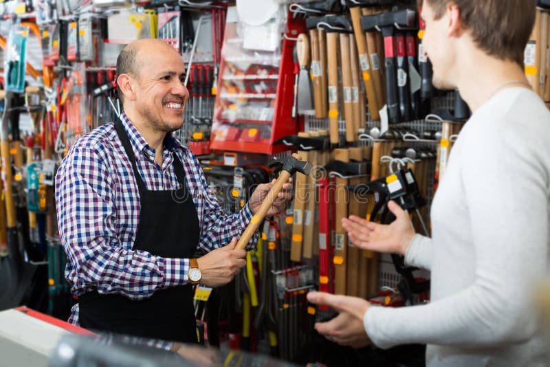 Salesman Showing Different Tools Stock Photo - Image of professional ...