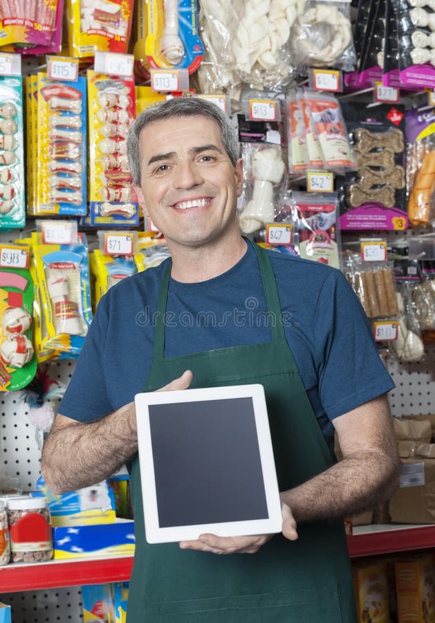 Salesman Showing Tablet Computer with Blank Screen in Pet Store Stock ...