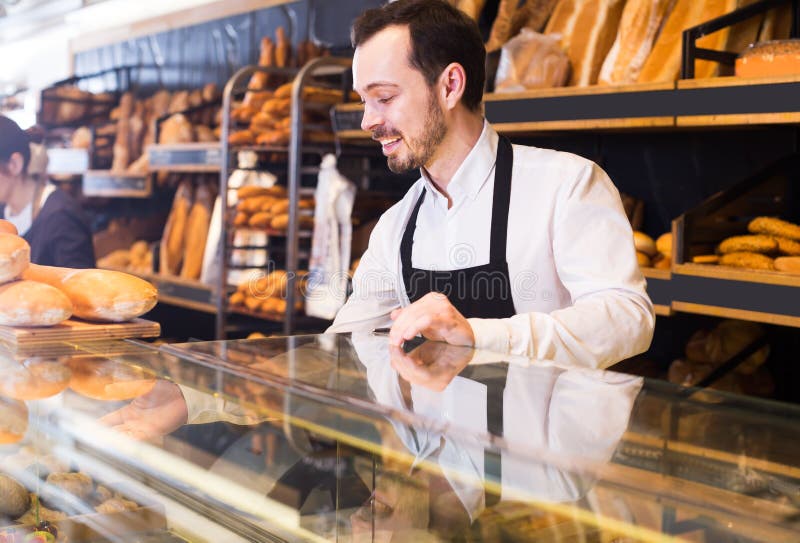 Salesman Shows Bakery Pastries Stock Photo - Image of food, dessert ...