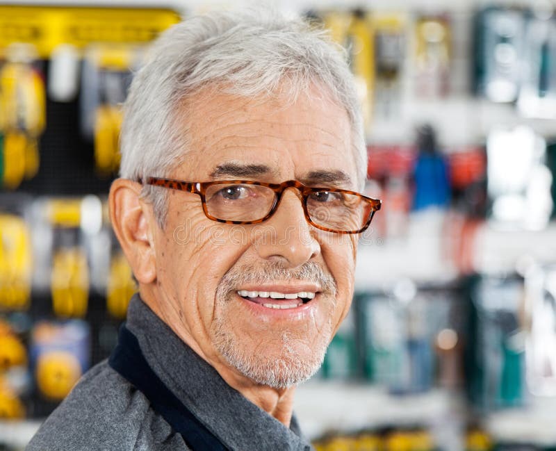 Salesman Smiling in Hardware Store Stock Photo - Image of entrepreneur ...