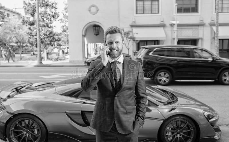 Salesman Speaking on Mobile Phone. Rich Guy Rent Car Stock Image ...