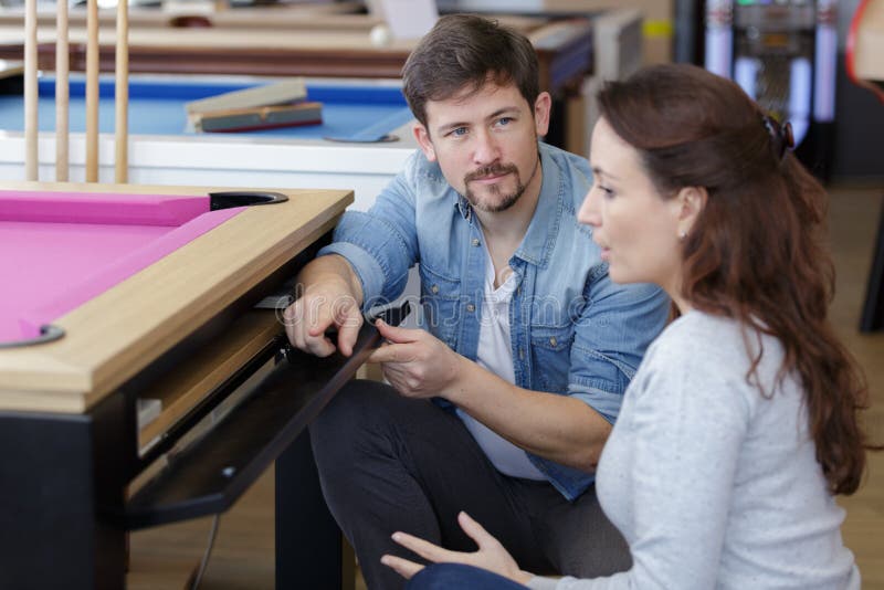 Salesman Talking To Female Customer Stock Image - Image of ball ...