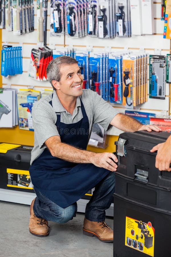 Salesman with Tool Box in Store Stock Photo - Image of salesperson ...