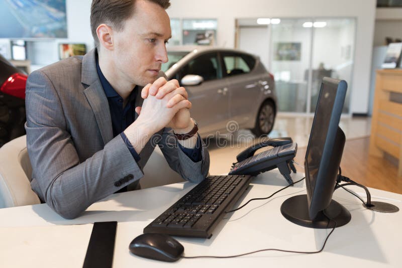 Salesman Using Computer in Car Showroom Stock Image - Image of mode ... Salesman Using Computer in Car Showroom Stock Image - Image of mode ...