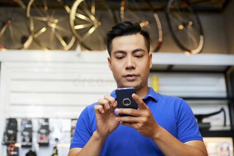 Salesman Using Mobile Phone Stock Image - Image of ethnicity, phone ...