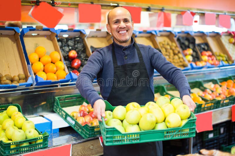 Salesman Working in Fruit Section Stock Image - Image of case, healthy ...