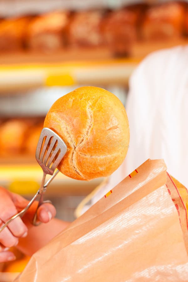 Salesperson is Packing Bread in Bakery Stock Photo - Image of ...
