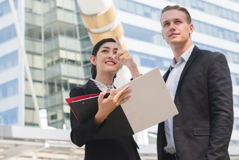 Salesperson Presenting Real Estate To Customer Stock Image - Image of ...