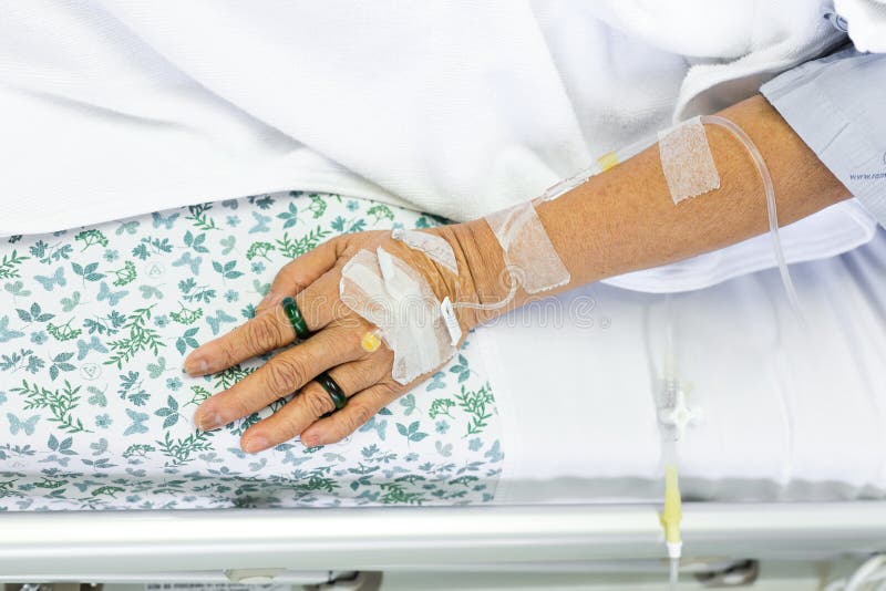Saline Solution To Patient Hand Stock Image - Image of tape, cure: 96034209