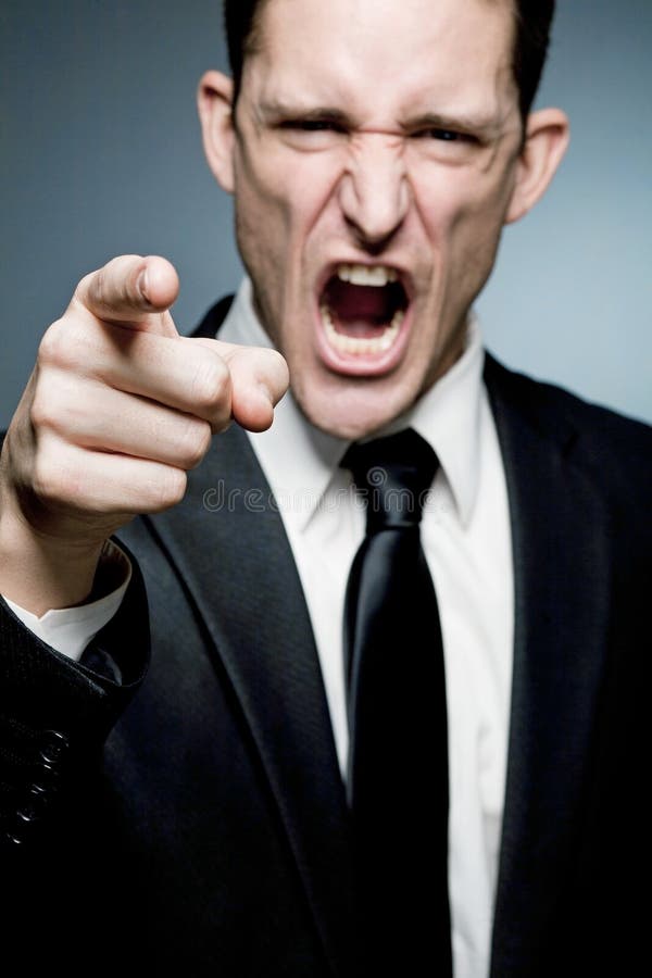 A Saliência Irritada Aponta O Dedo No Empregado E Grita. Imagem de ...