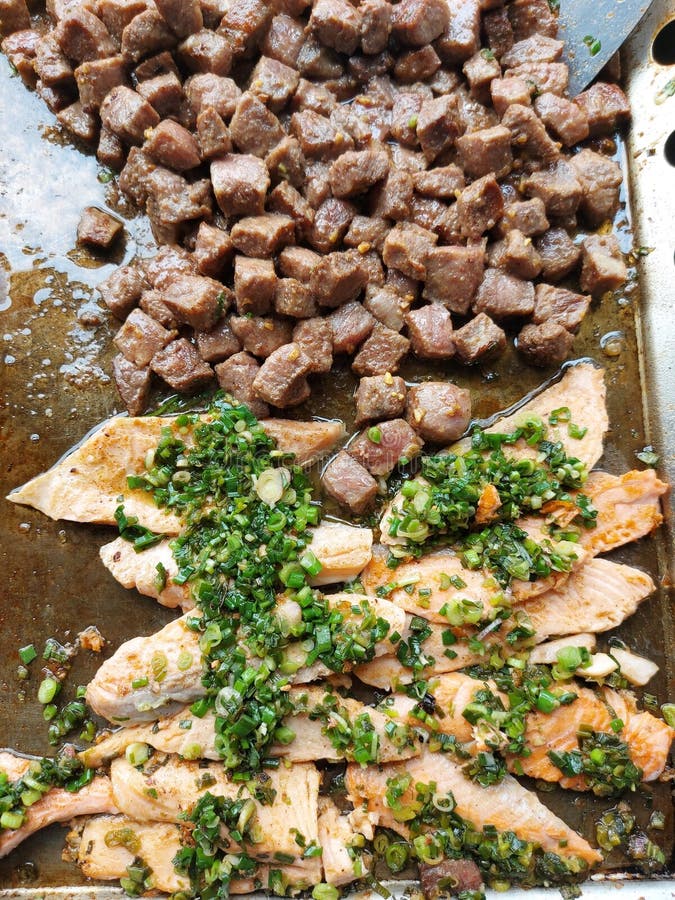 Salmon and Beef Meet on Their Flat Griddle really Tempting To Eat Stock ...