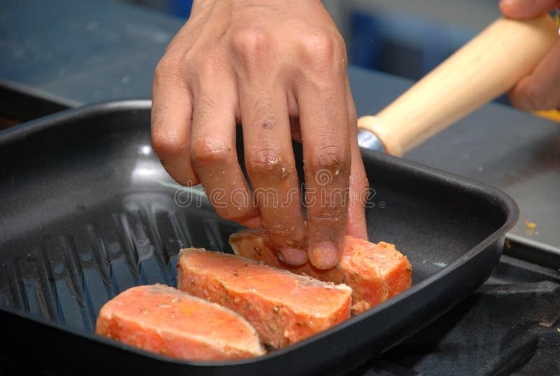 A Salmon fillet on a fried stock image. Image of fries - 31339163