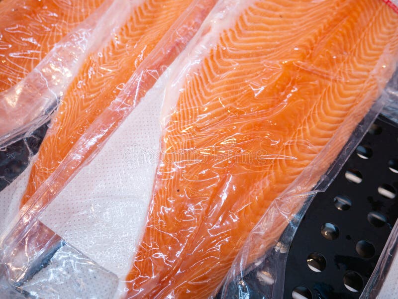 A Package of Salmon Fillets in Plastic Stock Image - Image of glass ...