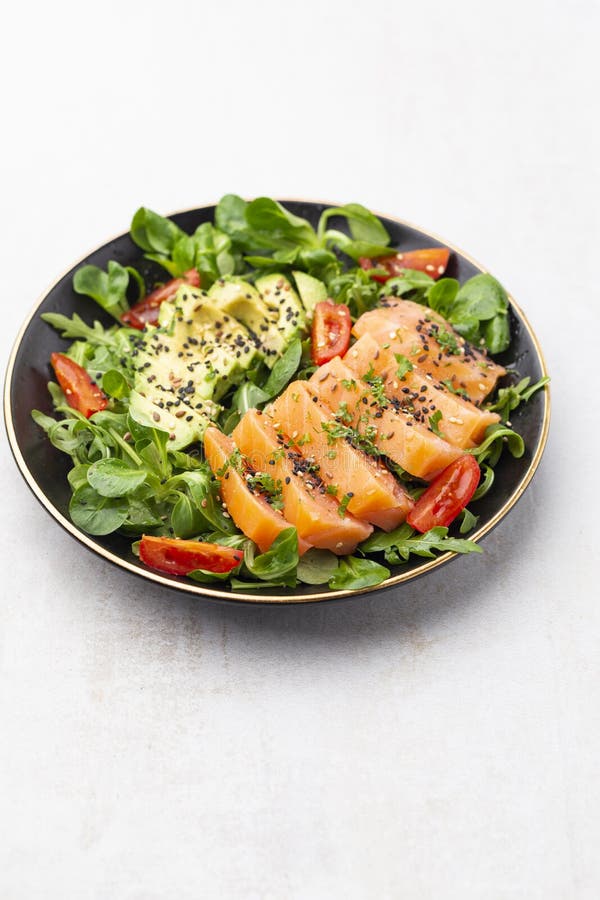 Salmon Fish Fillet with Fresh Salad, Avocado Top View Stock Photo ...