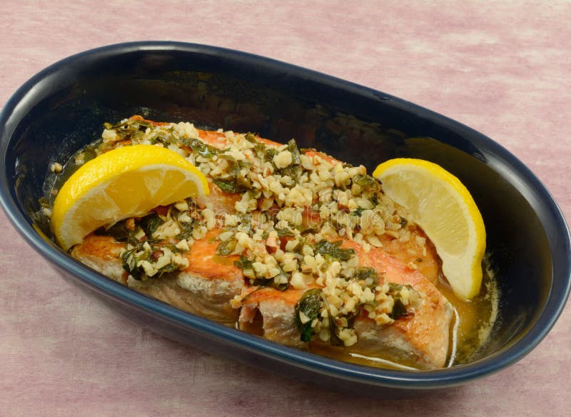 Salmon Fish Fillets with Nuts and Lemon Stock Image - Image of fillets ...