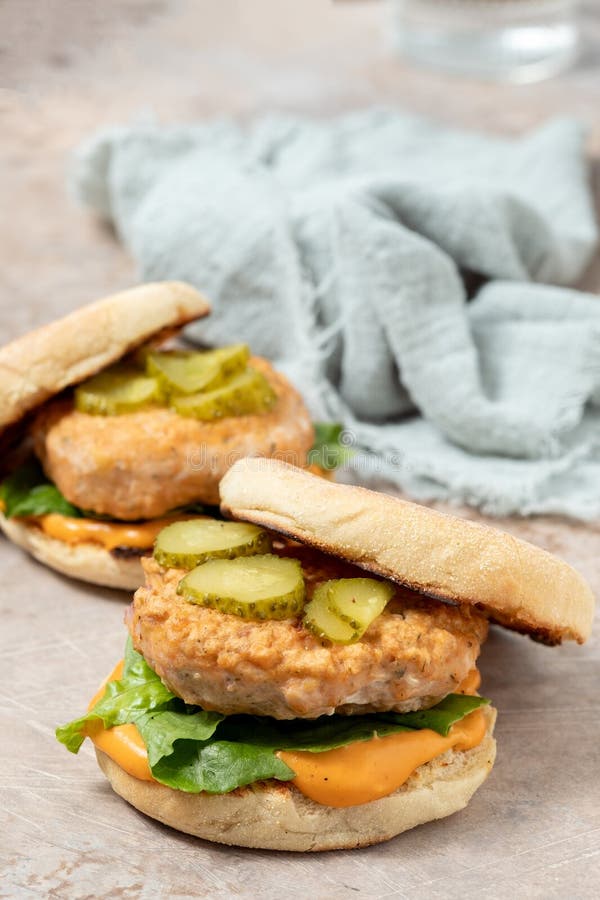Salmon Fishburger on English Muffin Stock Photo - Image of junk, muffin ...