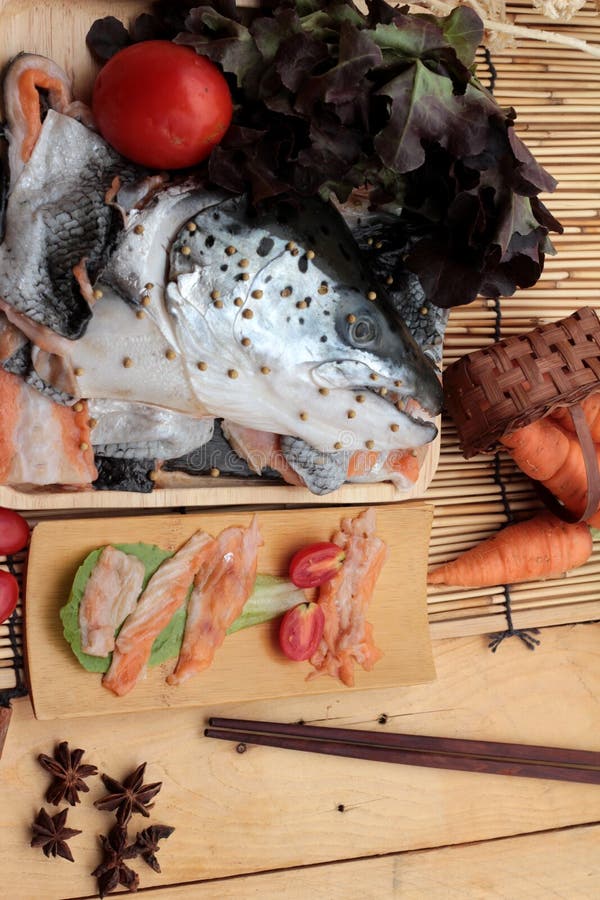 Salmon Head for Cooking and Fresh Salmon Fillets . Stock Photo - Image ...