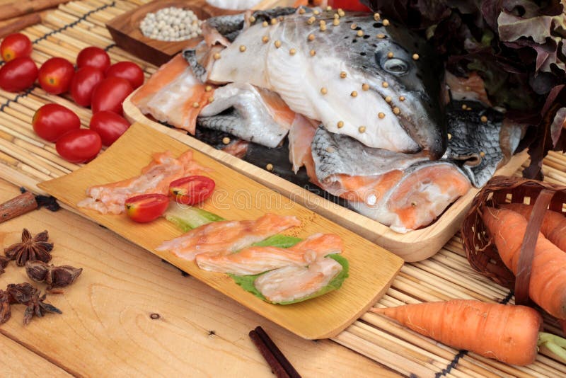 Salmon Head for Cooking and Fresh Salmon Fillets . Stock Image - Image ...