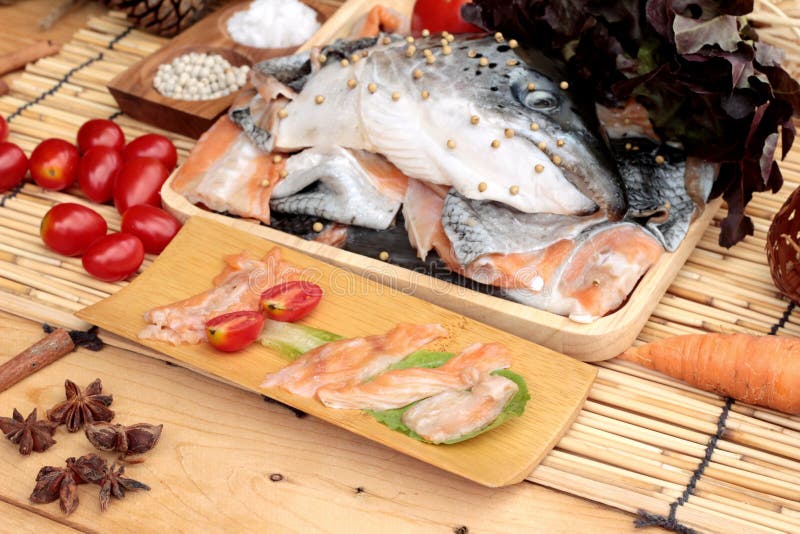 Salmon Head for Cooking and Fresh Salmon Fillets . Stock Image - Image ...