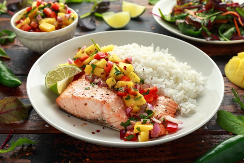 Salmon with Mango Salsa and White Rice on Plate Stock Image - Image of ...