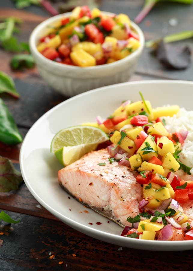 Salmon with Mango Salsa and White Rice on Plate Stock Photo - Image of ...