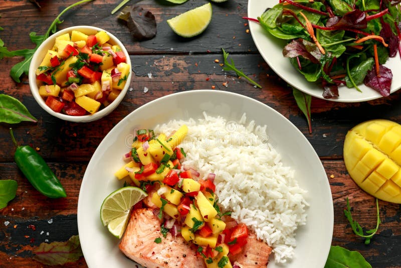 Salmon with Mango Salsa and White Rice on Plate Stock Image - Image of ...
