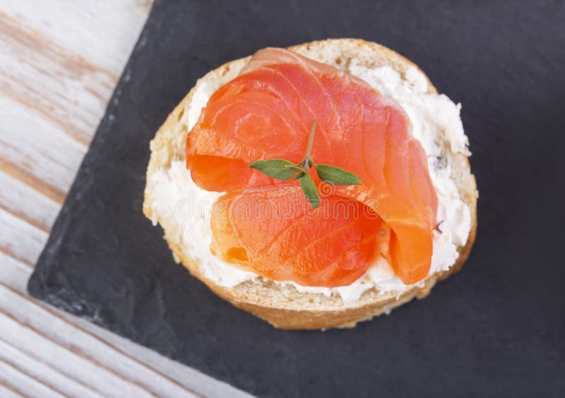 Salmon Mini Sandwiches on Black Slate Board Stock Photo - Image of ...