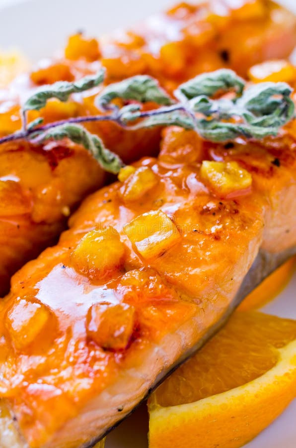 Salmon with orange sauce stock image. Image of baked - 24096241