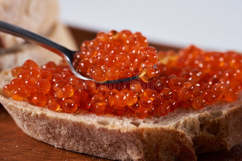 Salmon roe on bread stock photo. Image of restaurant - 228784170