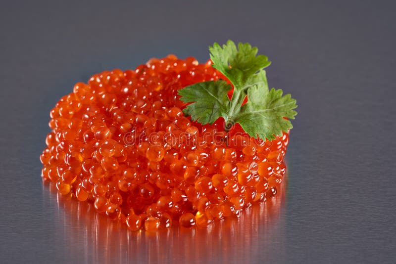 Salmon roe on metal stock image. Image of closeup, gourmet - 228784175