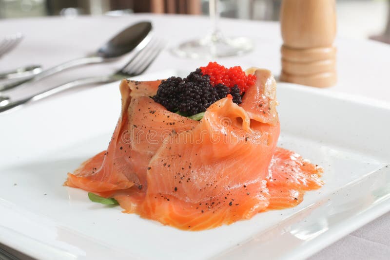 Salmon Salad with Rocket and Caviar Stock Photo - Image of ceramic ...