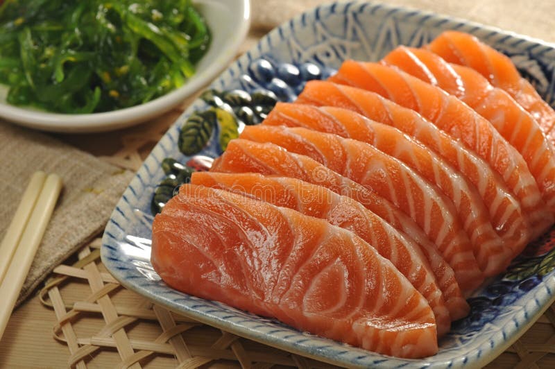 Salmon slice stock image. Image of urchin, wasabi, macro - 58164665