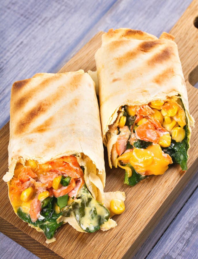 Salmon, Spinach, Cheddar Cheese and Corn Burritos. Fish Wraps Stock ...