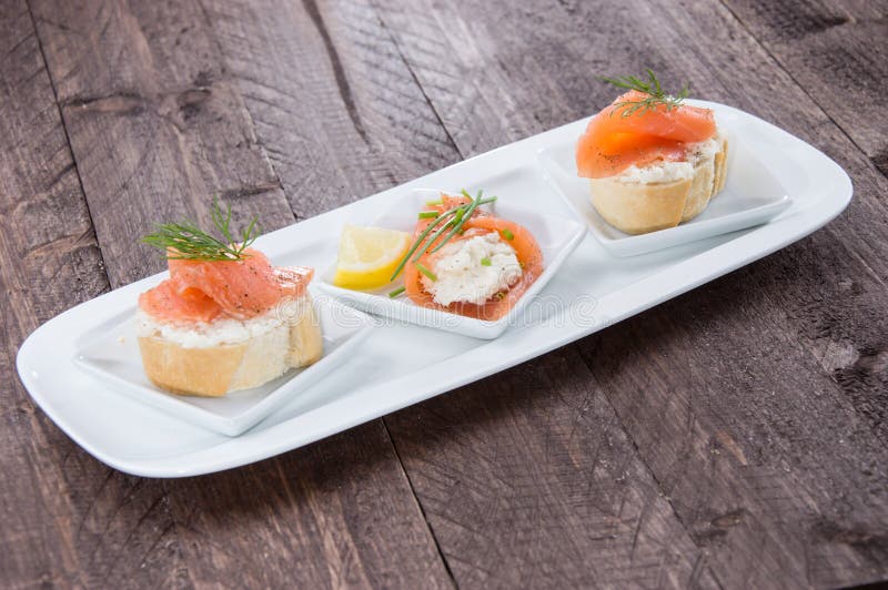 Salmon Starters on Small Plates Stock Image - Image of meat, background ...