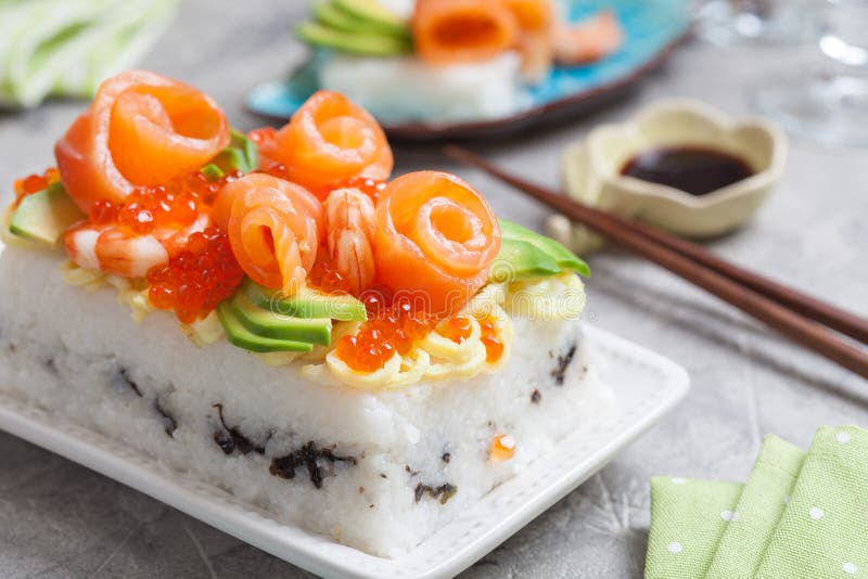 Sushi Cake with Lightly Salted Salmon, Nori and Avocado. Stock Photo ...