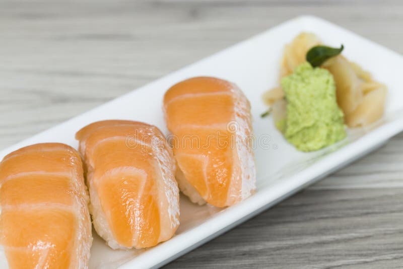 Salmon sushi with wasabi stock photo. Image of breakfast - 75407042