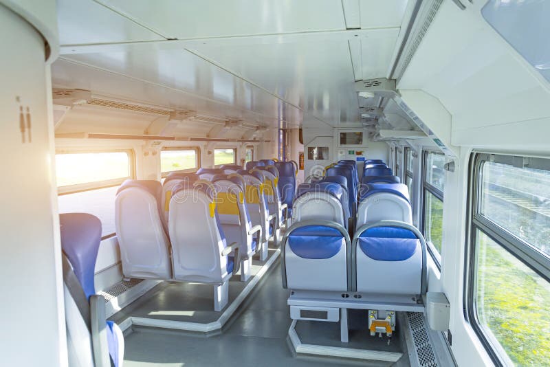 Salon Inside of the Speed Commuter Train with Empty Seats Staircase To ...