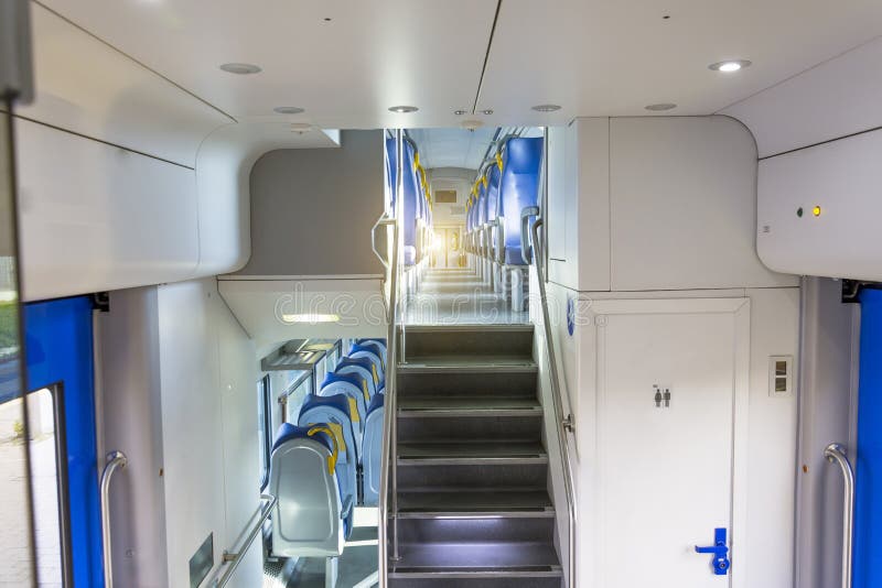 Salon Inside of the Speed Commuter Train with Empty Seats Staircase To ...