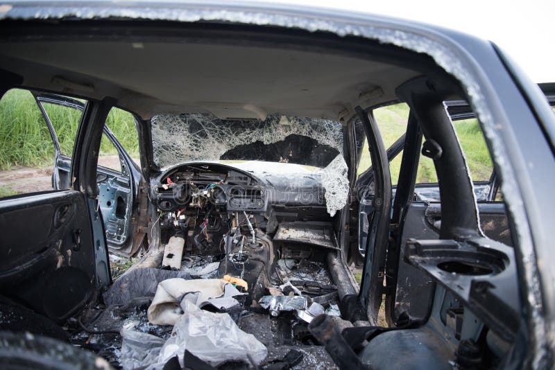 Smashed and Wrecked Cars of Green and Silver Color on the Parking Lot ...