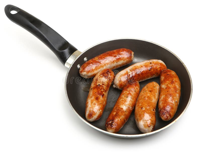 Salsicce cotte in padella immagine stock. Immagine di bianco - 33602683